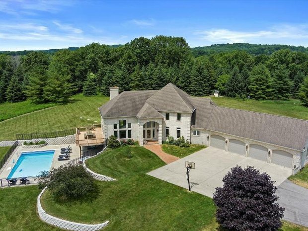 Luxury homes with wine cellar for sale in Colgate, Wisconsin | JamesEdition
