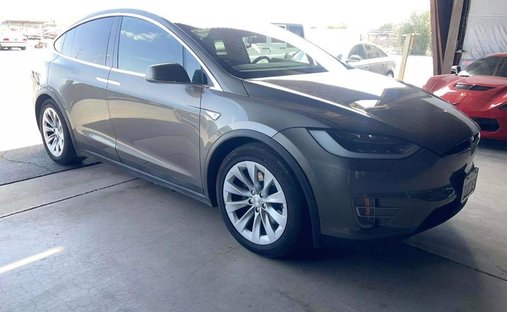 Gold Tesla for sale | JamesEdition