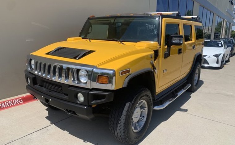 Yellow Hummer H2 Sut