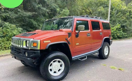 Orange Hummer for sale | JamesEdition