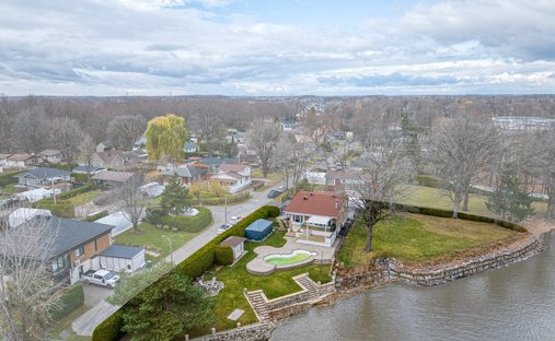 Luxury river view houses for sale in Boisbriand, Quebec, Canada | JamesEdition