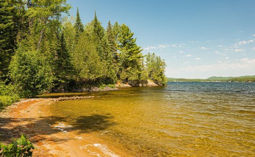 Lake view land for sale in Lac-des-Plages, Quebec, Canada | JamesEdition