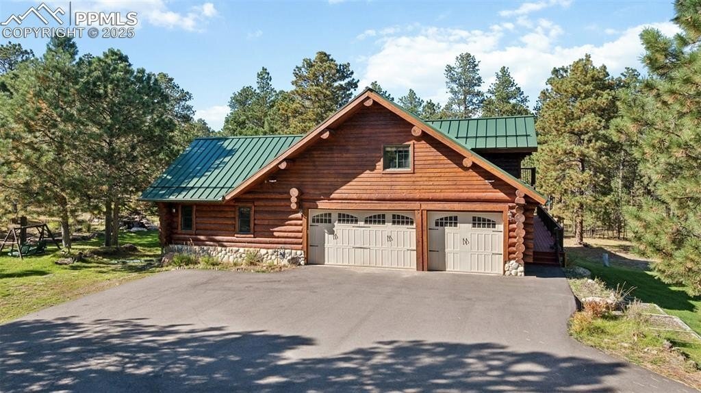 Secluded Log Estate With Waterfall In Colorado Springs, Colorado ...