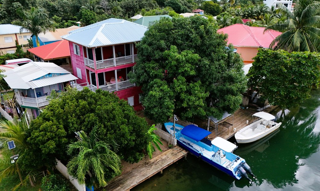 Spoonbill Spire: Canal Front In Placencia, Stann Creek District, Belize ...
